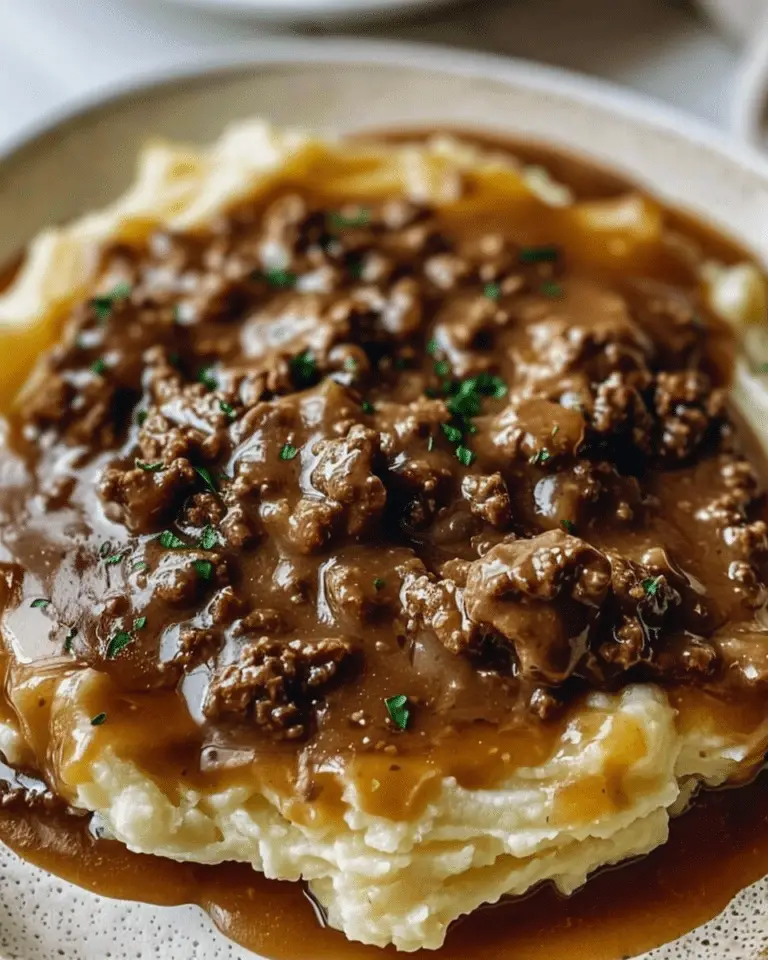 Ground Beef and Gravy Over Mashed Potatoes | CookedByMomy